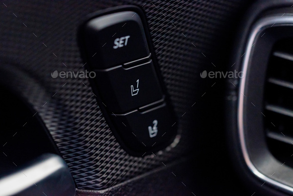 Close up shot of modern car central console with seat controls Stock ...