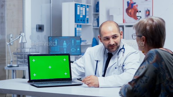 Green Screen laptop in doctor office Stock Photo by DC_Studio | PhotoDune