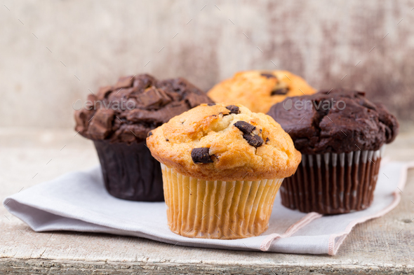 Homemade muffins with chocolate, vintage background. Stock Photo by ...