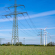 Overhead power lines and wind turbines Stock Photo by elxeneize | PhotoDune