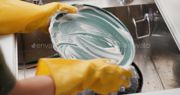 Wash dishes in kitchen at home Stock Photo by leungchopan | PhotoDune