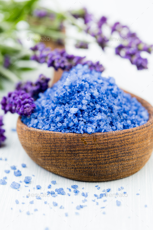 Essential lavender salt with flowers top view. Stock Photo by GitaKulinica