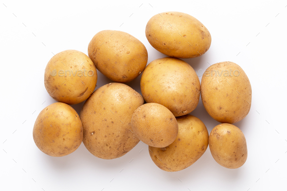 Potatoes isolated on white background. Flat lay. Top view. Stock Photo ...