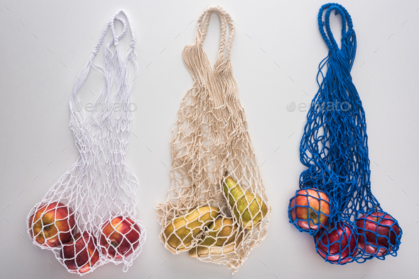 Top View of Fruits in Eco Friendly String Bags Isolated on White Stock ...