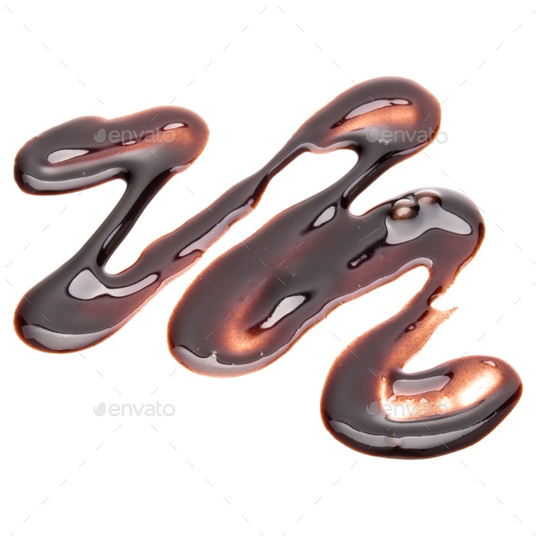 Chocolate syrup drop isolated on white background Stock Photo by natika