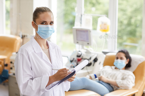 Doctor examining the patient Stock Photo by AnnaStills | PhotoDune