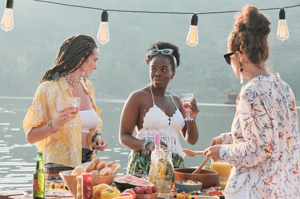 Women have lunch outdoors Stock Photo by AnnaStills | PhotoDune