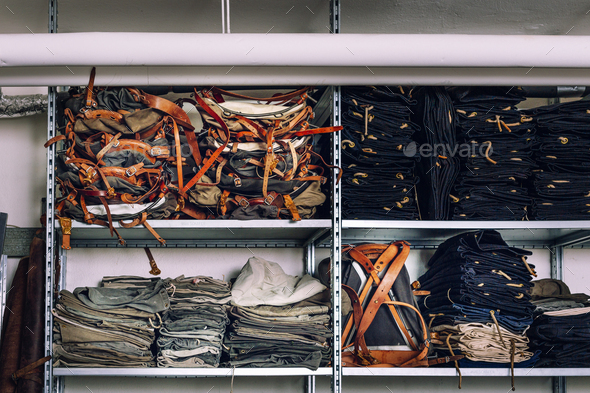 Stack of bags in shelves at factory Stock Photo by astrakanimages ...