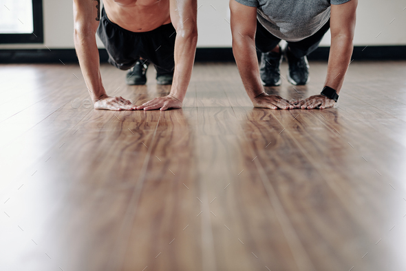 Men doing push-ups Stock Photo by DragonImages | PhotoDune
