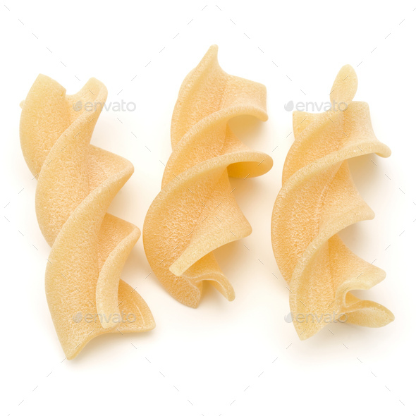 Italian twisted pasta fusilli isolated on white background. Fusilloni ...