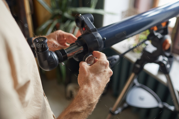 Man using telescope Stock Photo by AnnaStills | PhotoDune