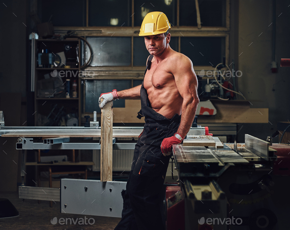 Portrait of shirtless muscular carpenter. Stock Photo by fxquadro ...