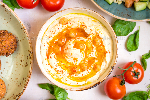 Hummus and middle eastern traditional dishes Stock Photo by its_al_dente