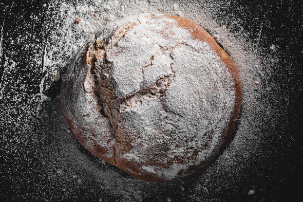 dark homemade bread dusted with flour Stock Photo by MegiasD | PhotoDune