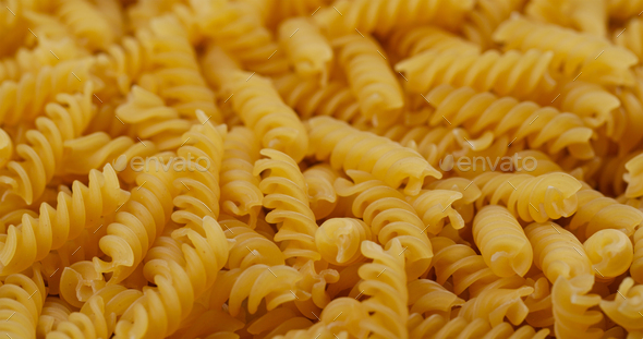 Stack of the dried fusilli Stock Photo by leungchopan | PhotoDune