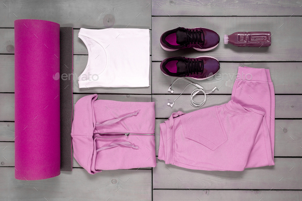 Overhead, flat lay of womans workout outfit. Stock Photo by bondarillia