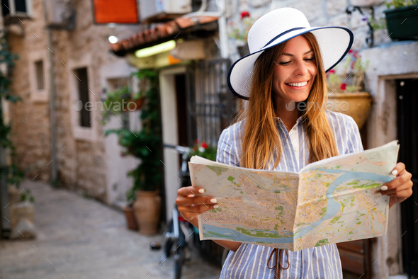 Beautiful happy woman, student enjoying travel and summer vacation ...