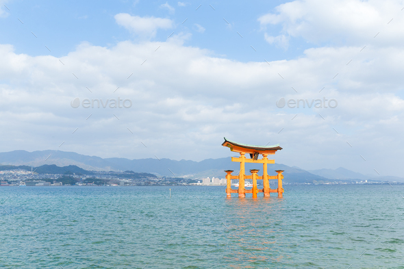 Floating gate of Itsukushima Shrine in Hiroshima Stock Photo by leungchopan