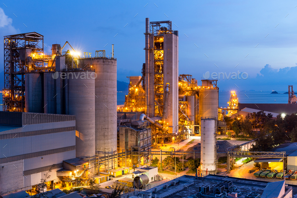 Cement factory at sunset Stock Photo by leungchopan | PhotoDune