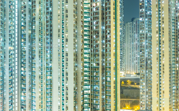 Packed building at night Stock Photo by leungchopan | PhotoDune