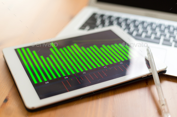 Digital tablet showing charts Stock Photo by leungchopan | PhotoDune