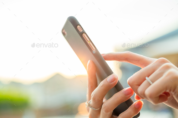 Finger touch on the screen of mobile phone Stock Photo by leungchopan