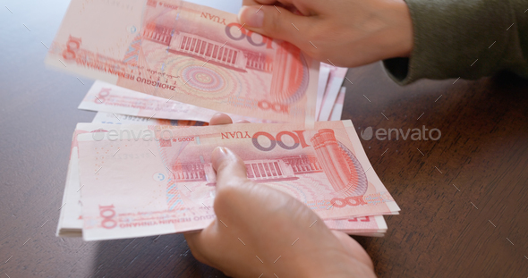 Woman counting RMB banknote Stock Photo by leungchopan | PhotoDune