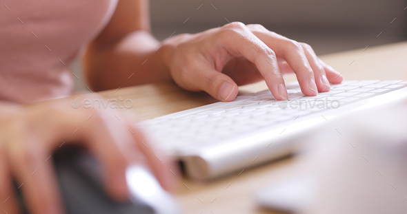 Hands typing on computer keyboard and use of mouse in office Stock ...
