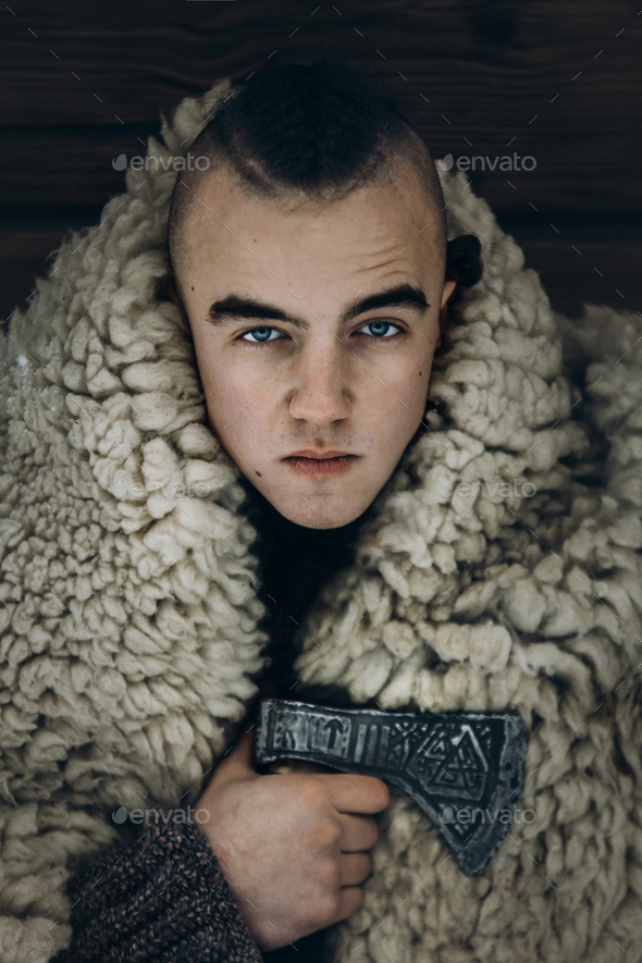 Viking portrait, strong handsome viking warrior with steel axe ritual ...