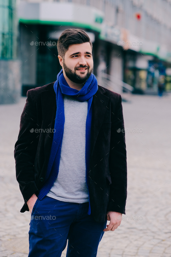 Handsome young man on a walk in town Stock Photo by diignat | PhotoDune