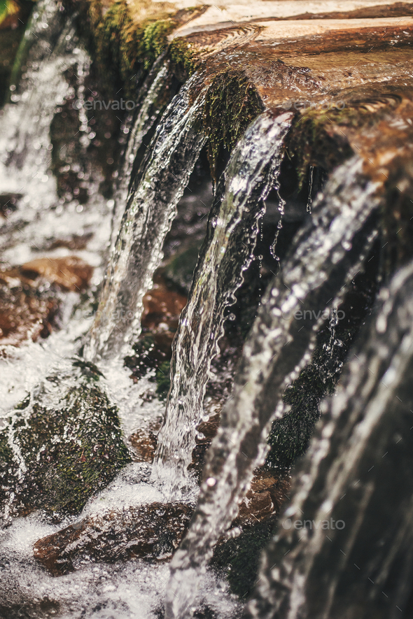 Close-up of water falling, water drops in beautiful waterfall Stock ...