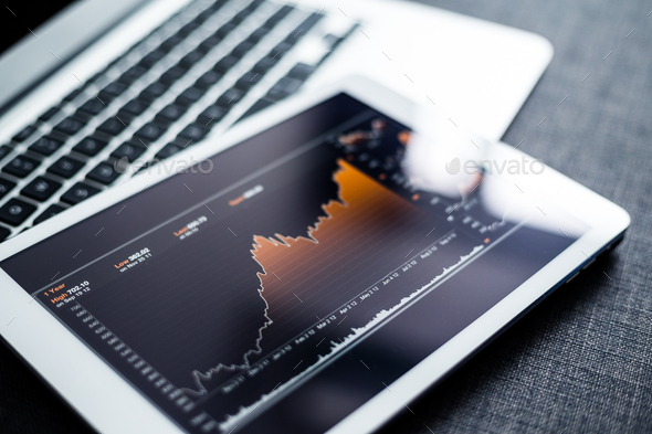 Stock market chart digital tablet Stock Photo by leungchopan | PhotoDune