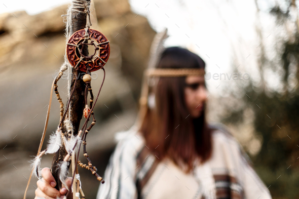 beautiful native indian american woman holding pikestaff with ...