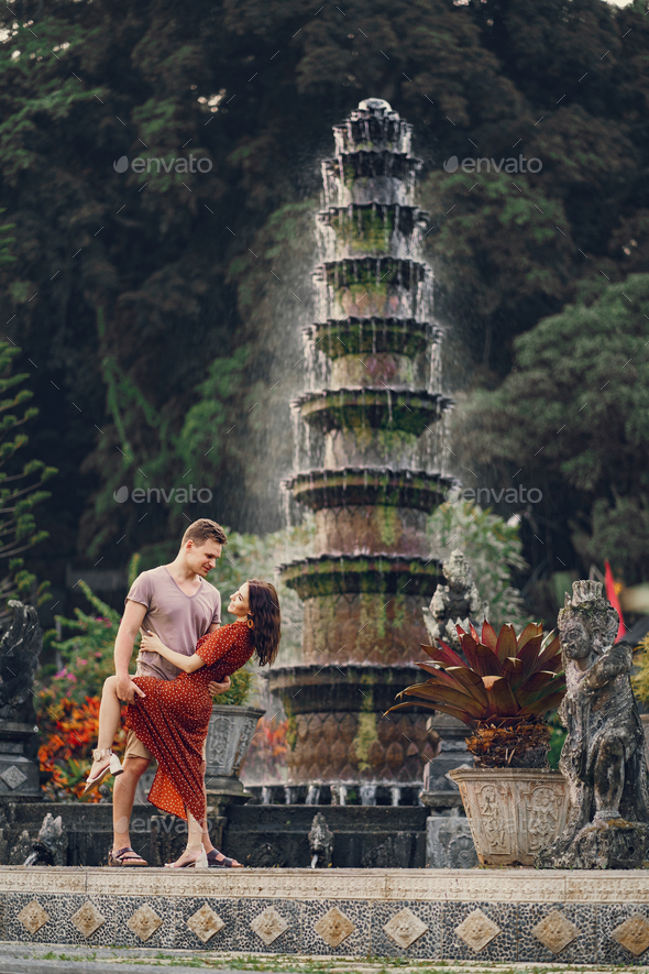 Couple standing on a temple background Stock Photo by prostooleh ...