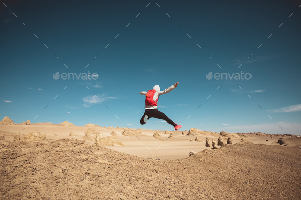 Woman trail runner cross country running on sand desert dunes Stock ...
