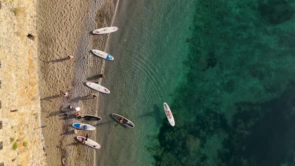 Sup surfing group aerial view 4 K Turkey Alanya, Stock Footage | VideoHive