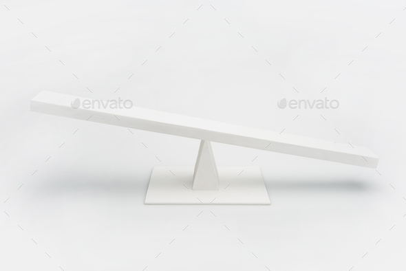 Close-up view of white wooden seesaw balancing isolated on grey Stock ...