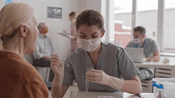 Young Nurse Collecting DNA Sample, Stock Footage | VideoHive