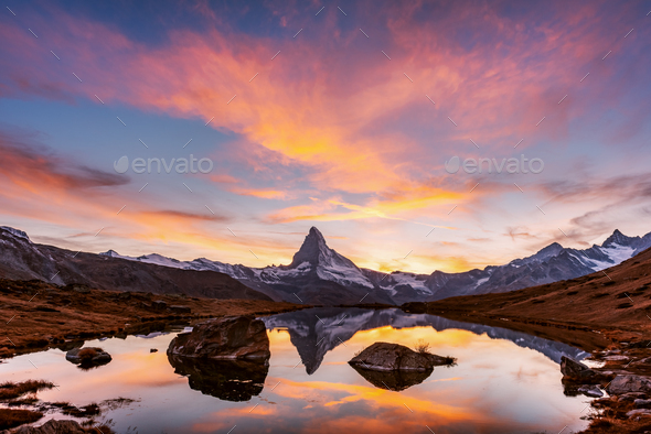 Incredible colorful sunset on Stellisee lake Stock Photo by ivankmit Incredible colorful sunset on Stellisee lake Stock Photo by ivankmit