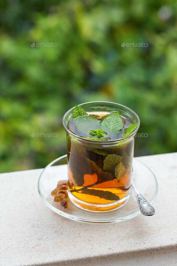 Glass of hot mint tea, traditional moroccan moorish beverage Stock ...