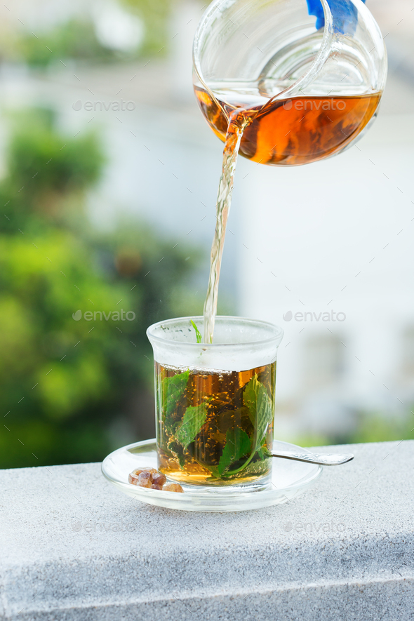 Glass of hot mint tea, traditional moroccan moorish beverage Stock ...