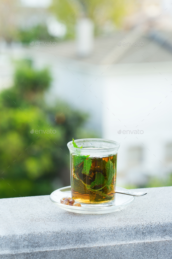 Glass of hot mint tea, traditional moroccan moorish beverage Stock ...