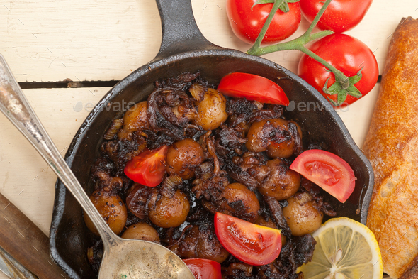 Baby cuttle fish roasted on iron skillet Stock Photo by keko64 | PhotoDune