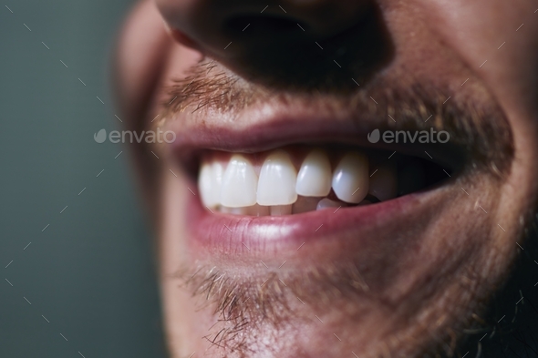 Toothy smile of young man Stock Photo by Chalabala | PhotoDune