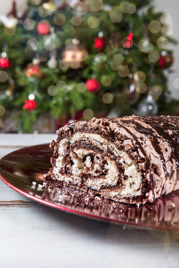 Belgian Chocolate Meringue Roulade filled with whipped cream and Stock ...