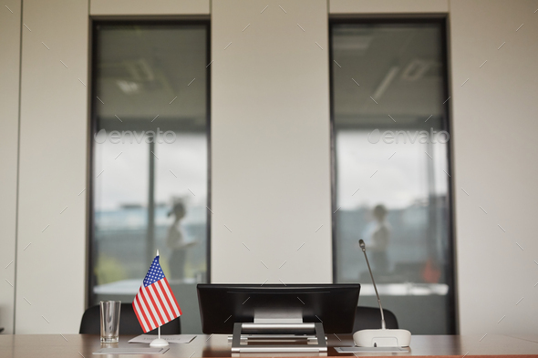Conference Room with American Flag Stock Photo by seventyfourimages