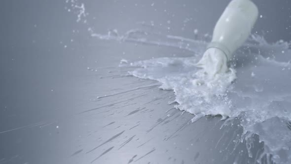 Dropping milk bottle, Slow Motion, Stock Footage | VideoHive