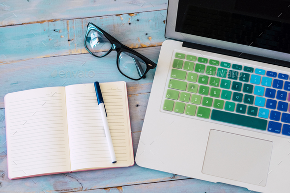 Computer laptop and paper notes with glasses Stock Photo by simonapilolla