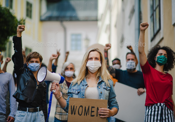 Group of people activists protesting on streets, women march and ...