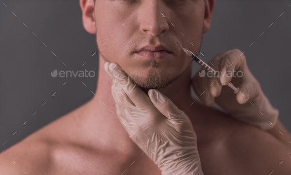 Man getting injection Stock Photo by GeorgeRudy | PhotoDune